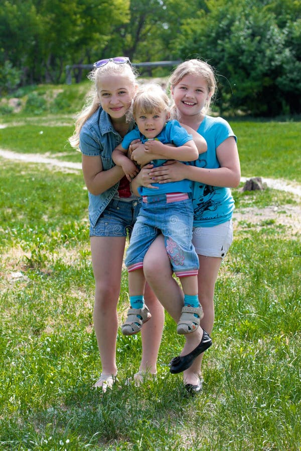 Three sisters stock image. Image of look, meadow, park - 24848655