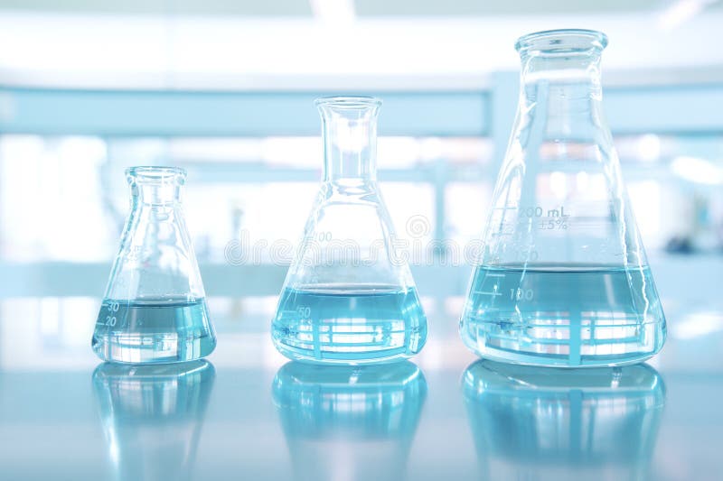 Three Glass Flask in Blue Chemistry Science Laboratory Background Stock ...