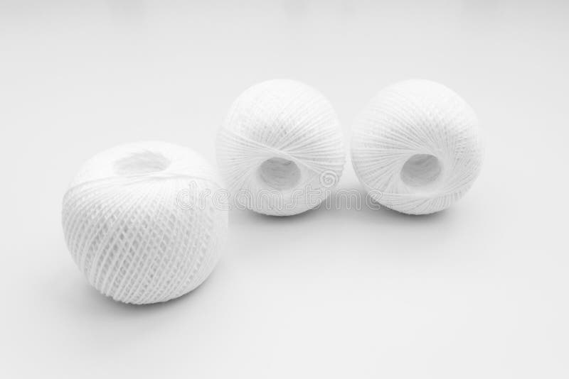 Three Skeins of White Thread on White Background, Abstract Background ...