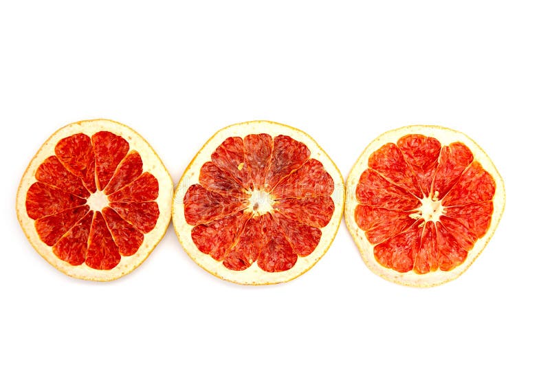 Three Slice of Dried Grapefruit Close-up on White Background Stock ...