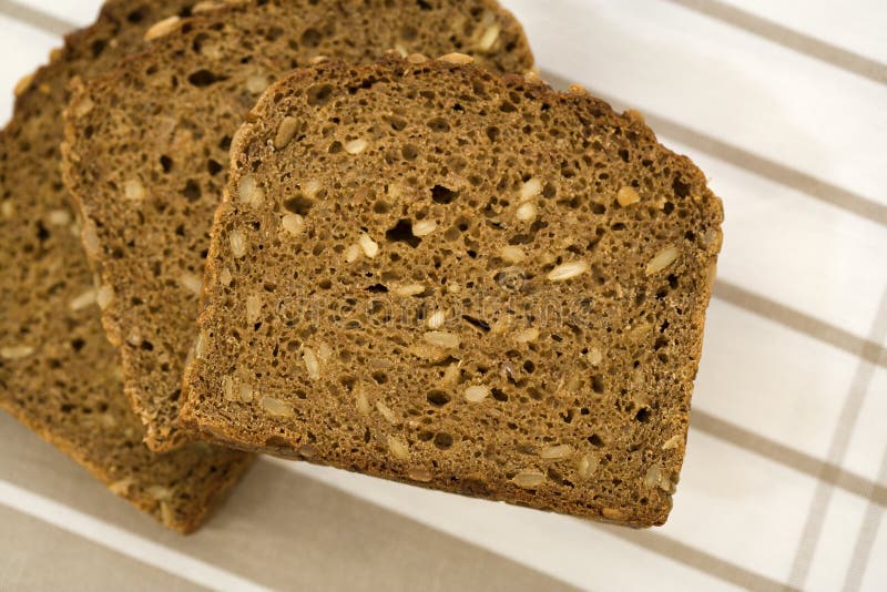 Three Slices of Brown Bread Stacked Stock Photo - Image of healthy ...
