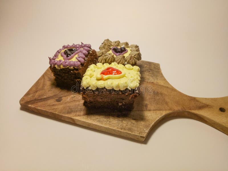 Three slices of cake stock image. Image of brown, calories - 229487133