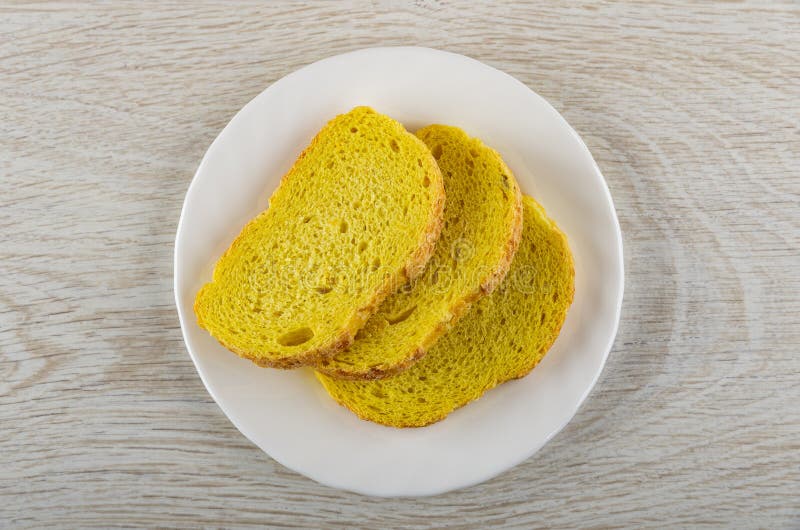 Three Slices of Cornbread in Plate on Table. Top View Stock Photo ...