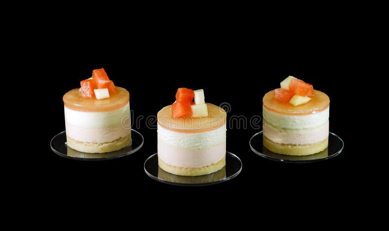 Three Small Cakes Decorated with Different Fruits Stock Photo - Image ...