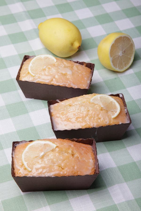 Three small lemon cakes stock photo. Image of citrus - 21556144