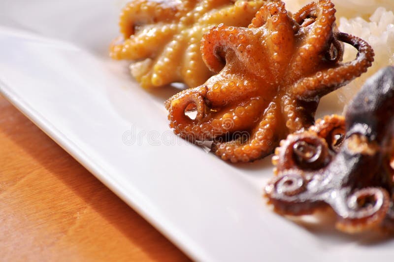 Small Fried Octopus and Wooden Chopsticks. Stock Image - Image of ...