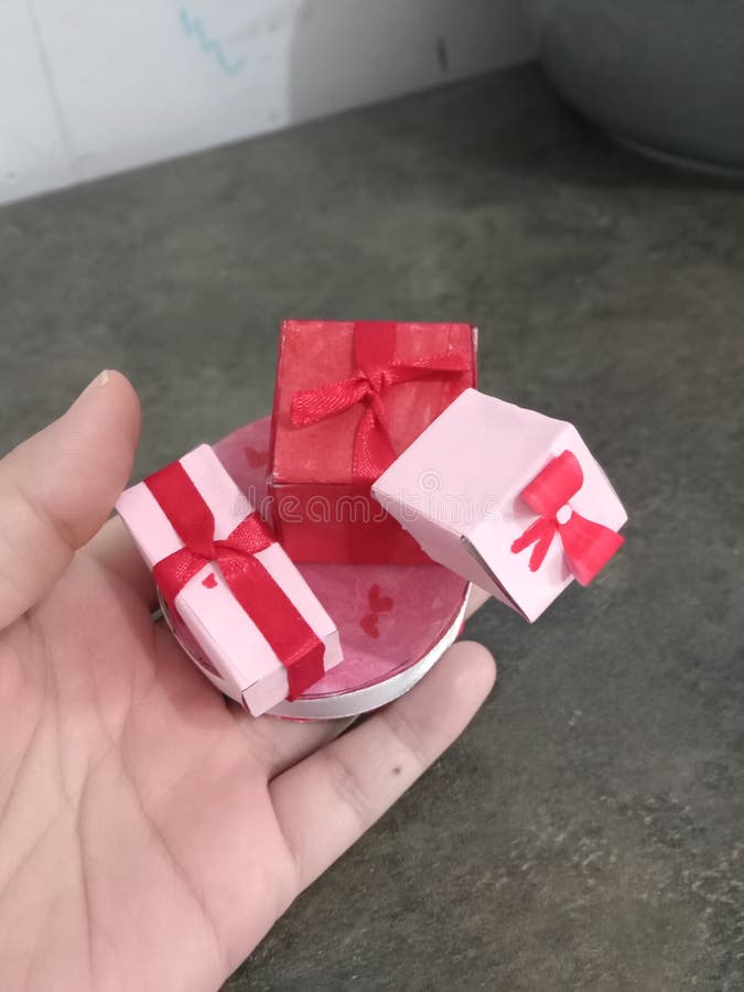 Three Small Pink Themed Gift Boxes, Arranged in Such a Way Using Glue ...