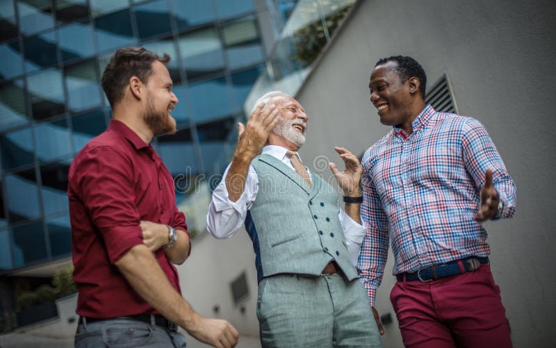 Three Smiling Business Men Talking Stock Image - Image of cheerful ...