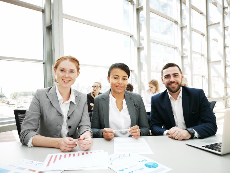 Three Smiling Business People Stock Image - Image of colleague ...