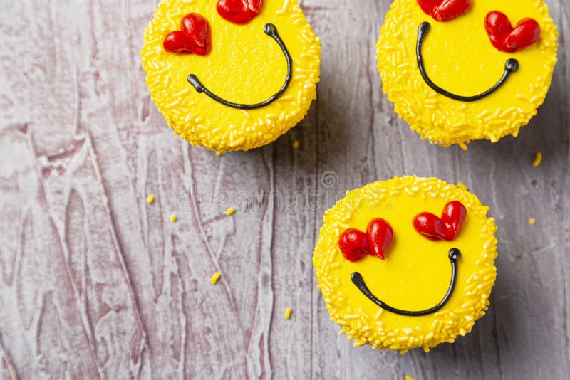 Three Smiling Cupcakes stock image. Image of smiling - 172930303