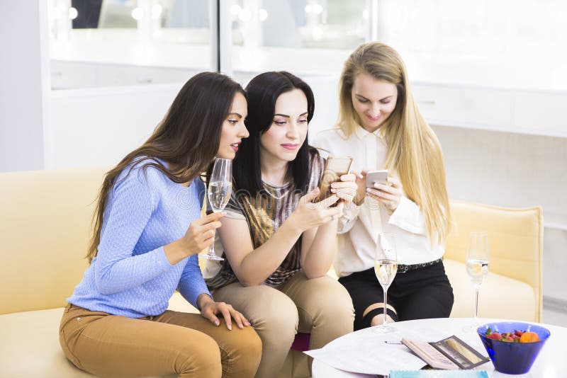Three Smiling Female Friends Taking Selfie from Mobile Phone Stock ...