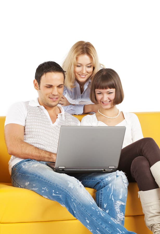 Three Smiling Friends with Laptop Computer Stock Photo - Image of ...