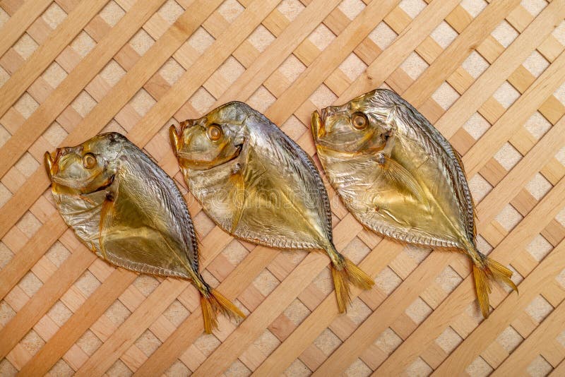 Three Smoked Sea Fish Selene Close-up on a String Stock Image - Image ...