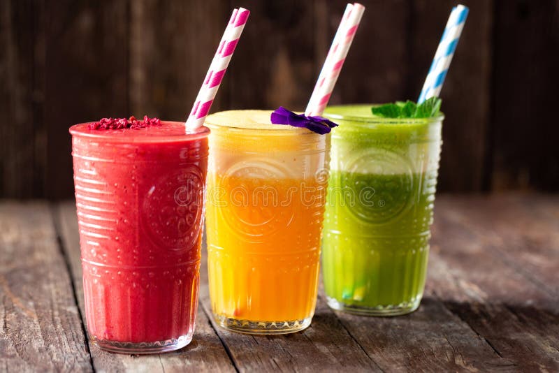 Three Smoothies in Glasses Served on the Table Stock Image - Image of ...