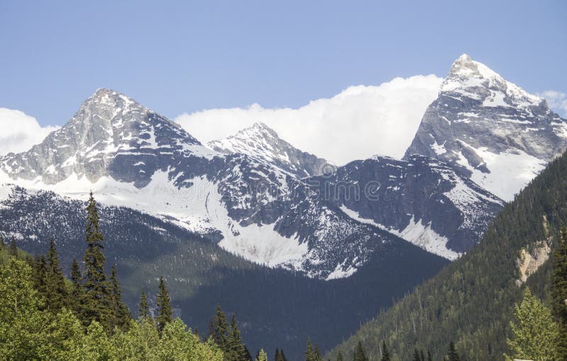 Three Snow Covered Mountains Stock Photo - Image of snow, peaks: 77938412