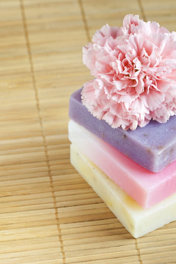 Three soap bars and flower stock photo. Image of homemade - 25068568