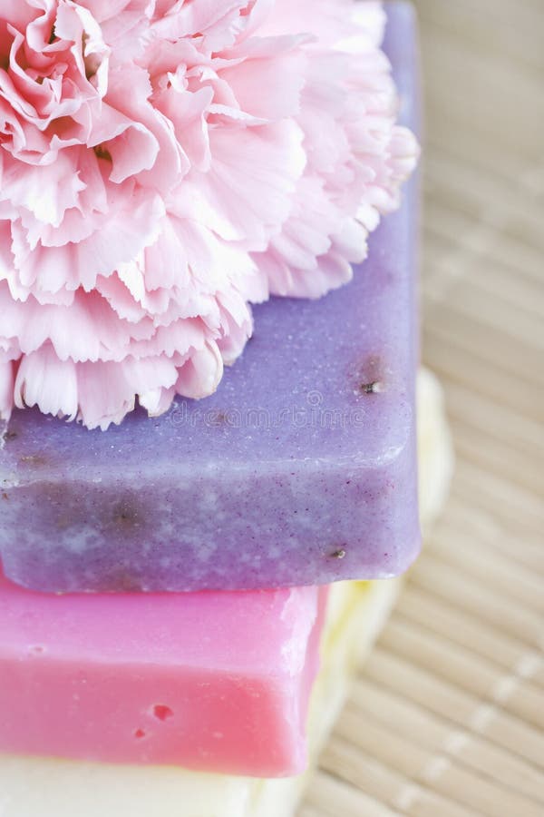 Three soap bars and flower stock photo. Image of homemade - 25068568
