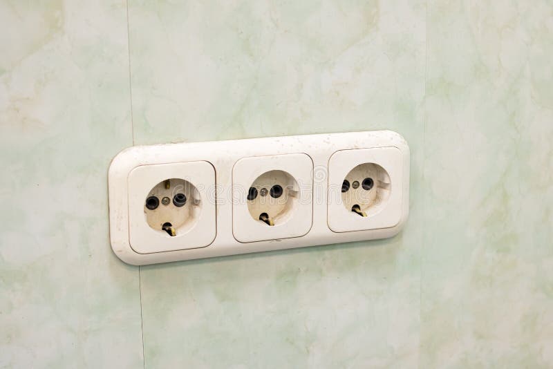 Set of Three Sockets on the Wall Stock Photo - Image of triple, room ...