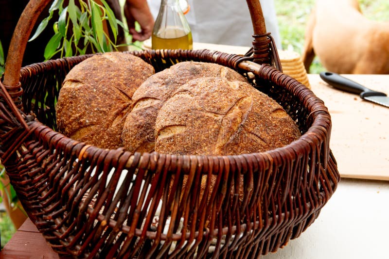 Three Sourdough Whole Grain Loaf of Bread in the Basket Stock Photo ...
