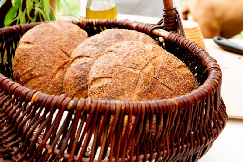 Three Sourdough Whole Grain Loaf of Bread in the Basket Stock Photo ...
