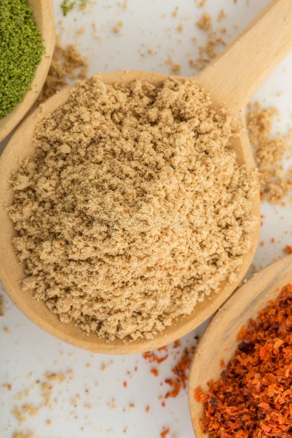 Three Spices in Wood Spoons White Background Stock Photo - Image of ...