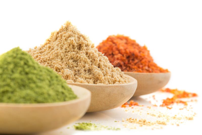 Three Spices in Wood Spoons White Background Stock Photo - Image of ...