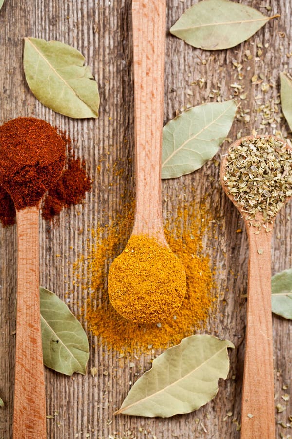 Three Spices in Wooden Spoons Stock Image - Image of flavoring, beige ...