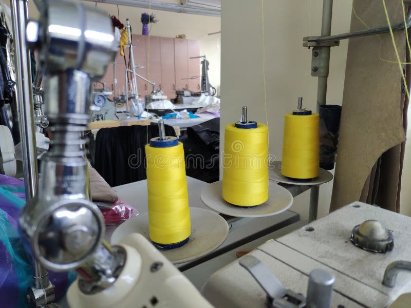 Sewing Machine with Black Thread Ready for Work Against the White Table ...