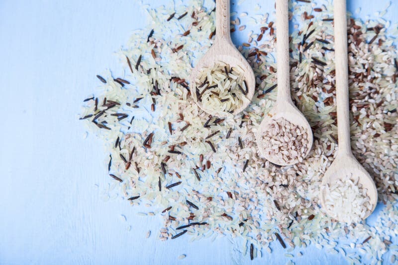 Three Spoons with Different Grades of Rice Stock Image - Image of ...