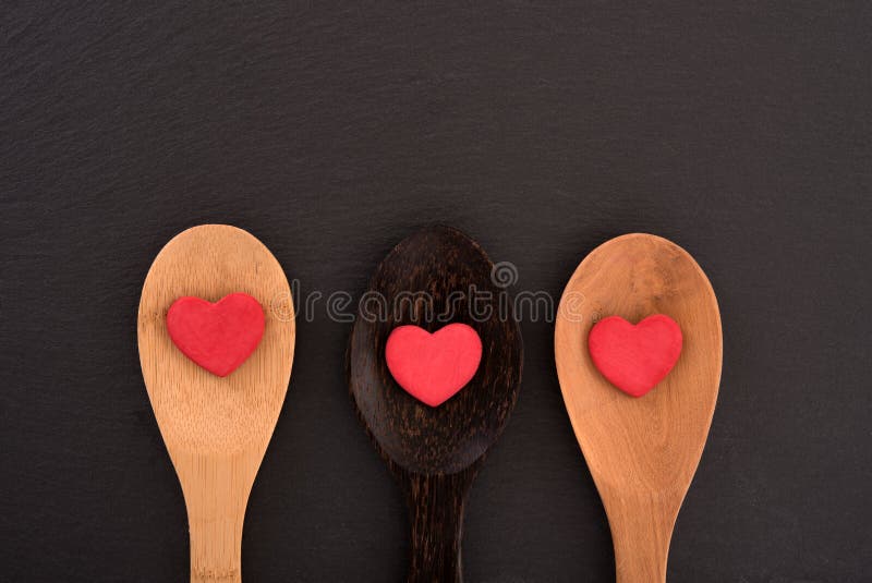 Three spoons with hearts stock image. Image of shape - 66529735