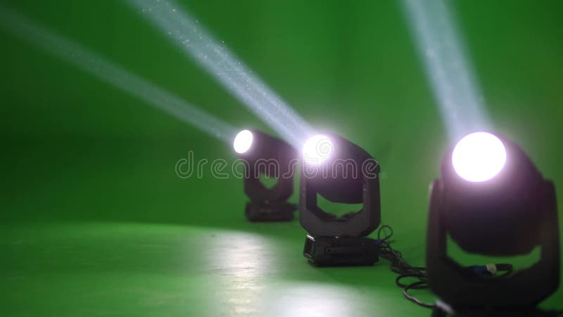 Three Spotlights Shining Light Rays in Green Stock Video - Video of ...