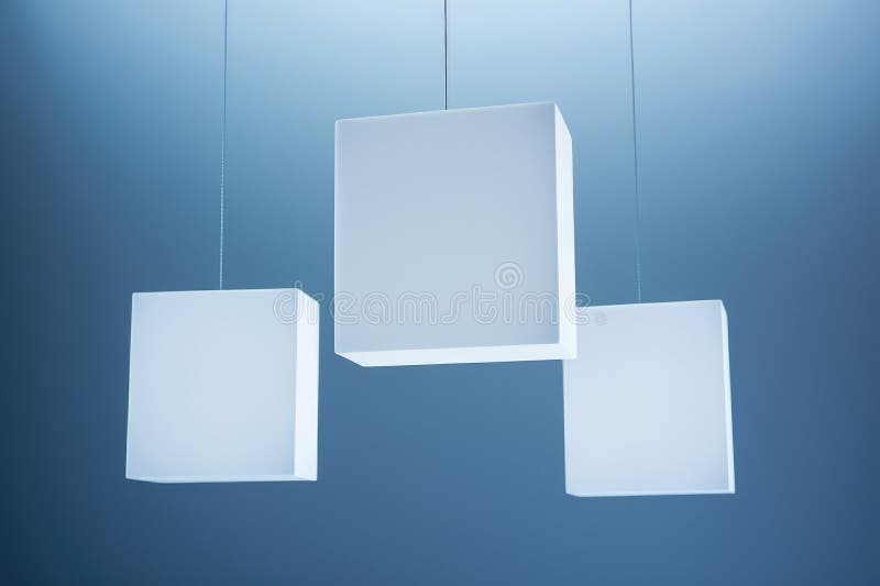 Three Square Lamps Hanging from Ceiling in Room. Perfect for Interior ...