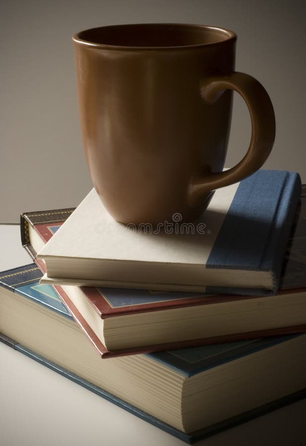 Three Stacked Books with Mug Stock Image - Image of abstract, education ...