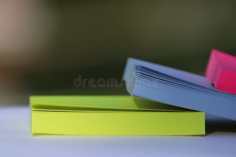Piled Bright Colored Sticky Note Blocks; Green, Blue, Pink and Purple ...