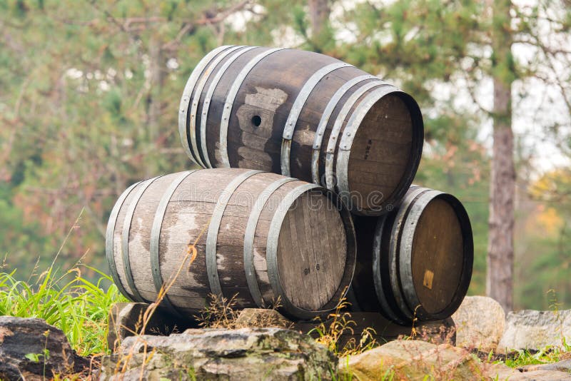 Three Stacked Wine Barrels stock photo. Image of outdoors - 44039344