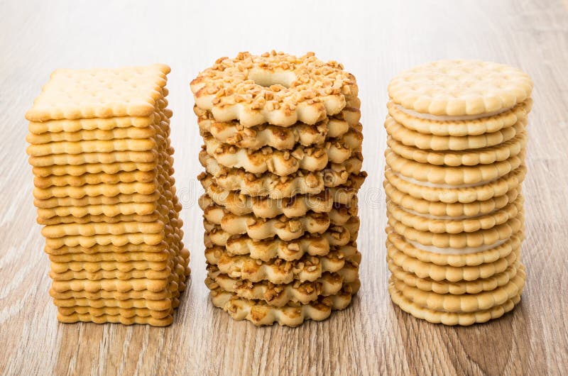 Three Stacks with Different Cookies on Table Stock Photo - Image of ...
