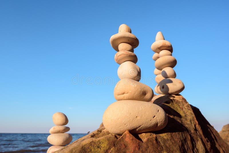 Three stacks of stones stock image. Image of equilibration - 72031953