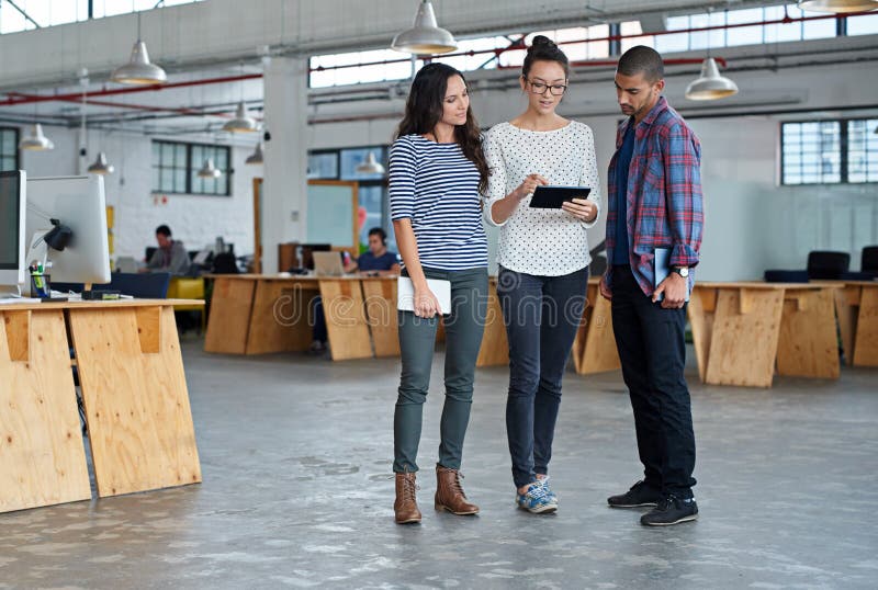 Theyve Got Technology on Their Side. Three Staff Members Chatting about ...