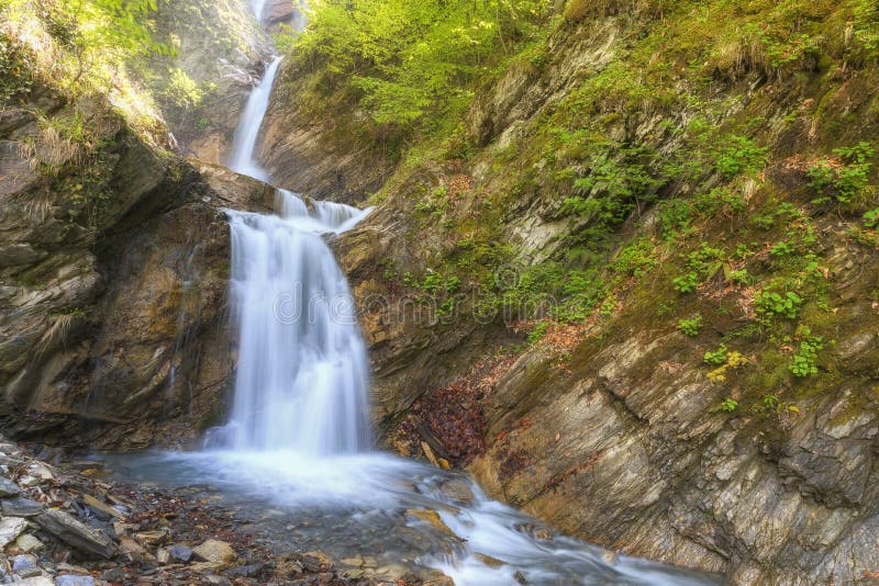 Three-stage Waterfall in the Spring in the Mountains Stock Photo ...