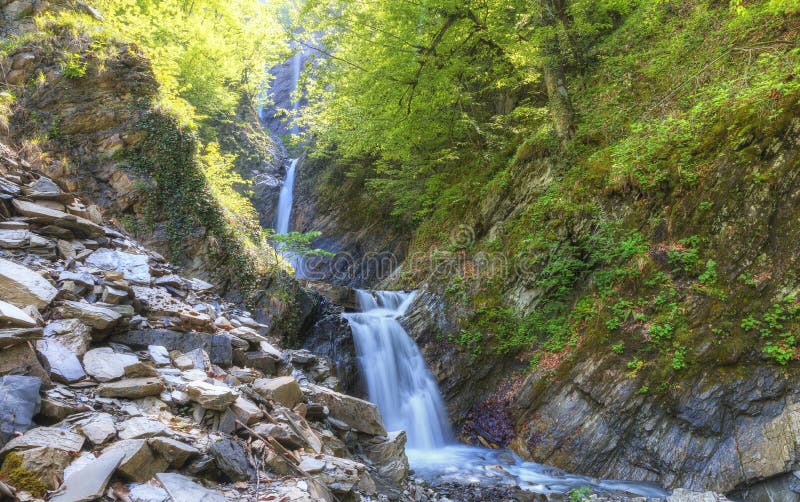 Three-stage Waterfall in the Spring in the Mountains Stock Image ...