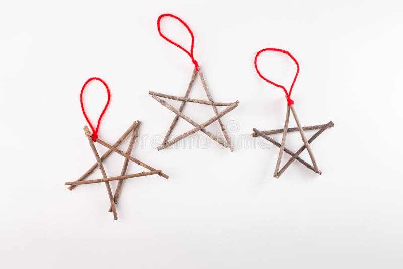 Three Star Shaped Figures Made from Twigs, Tied at Points, with Red ...