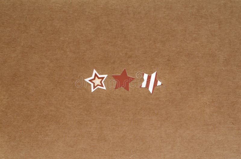 Three Stars on Brown Craft Paper Background Stock Photo - Image of ...
