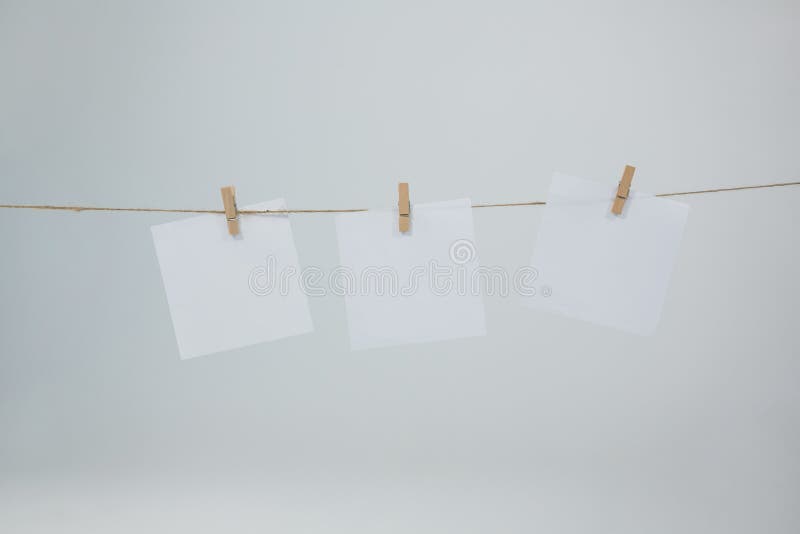 Three Sticky Notes Hanging on Clothes Line Stock Photo - Image of shot ...