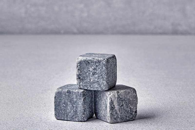 Three Stone Cubes on a Gray Concrete Background. Backdrop Template for ...