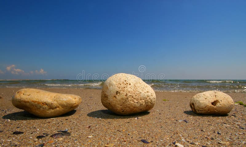 Three stones balancing stock image. Image of gravity, balance - 320301