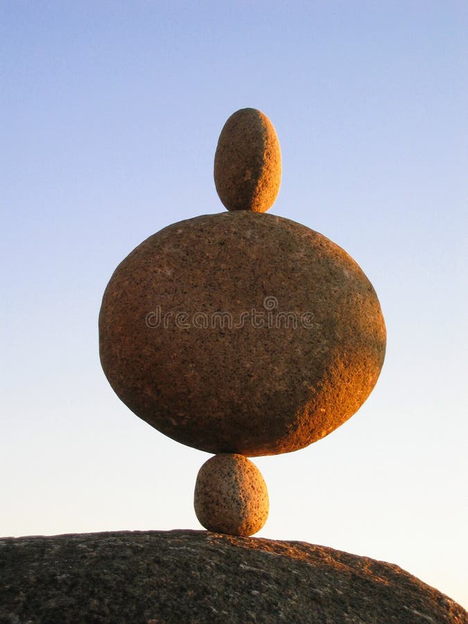 Three stones balancing stock image. Image of gravity, balance - 320301