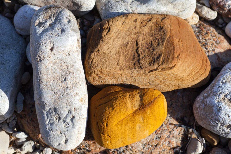 Three Stones of Different Colors Stock Photo - Image of hard, outdoor ...