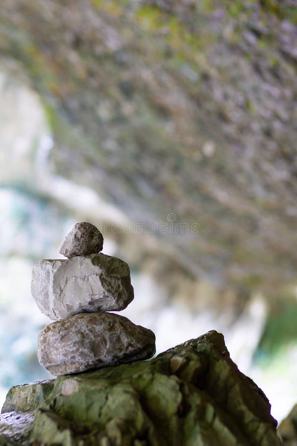 Three Stones Pyramid in the Cave Stock Photo - Image of tranquil, cave ...
