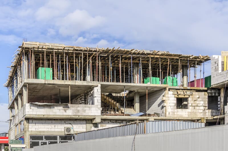A Three-storey House Under Construction a Block Against the Sky Stock ...