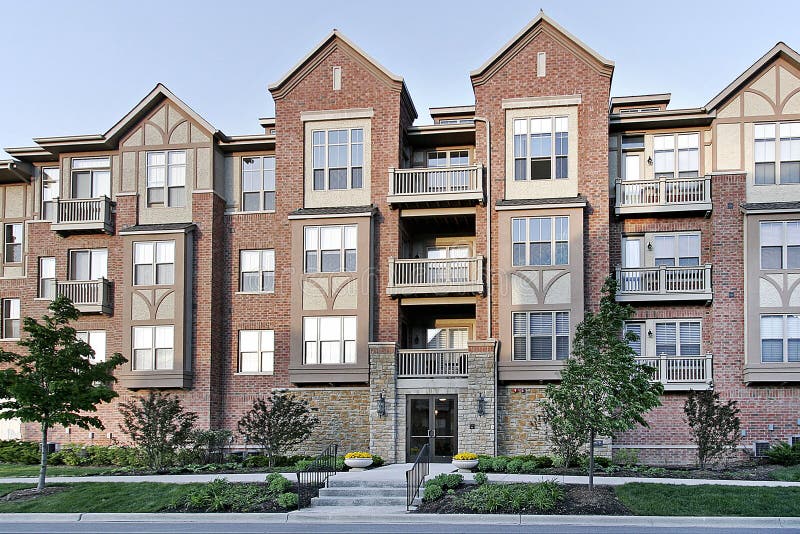 Three Story Tudor Style Condominium Stock Image - Image of landscape ...